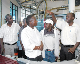 Standard Group Head of Print (Production) George Okoth (right) and ...