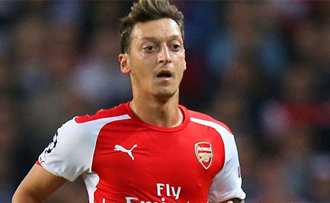 Arsenal can still win title, insists Ozil