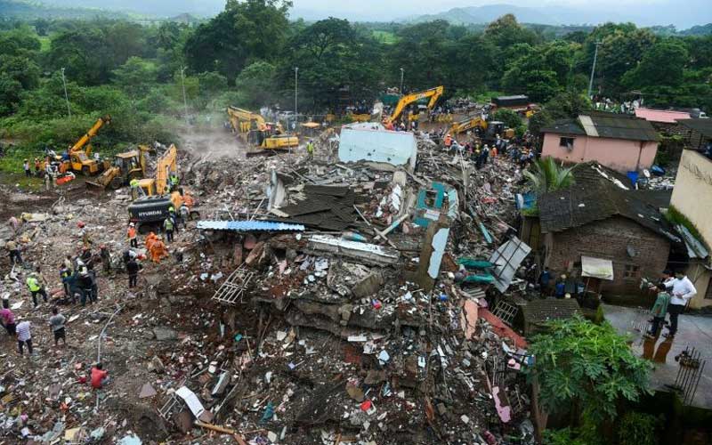 India rescuers pull 4-year-old survivor from collapsed building - The ...